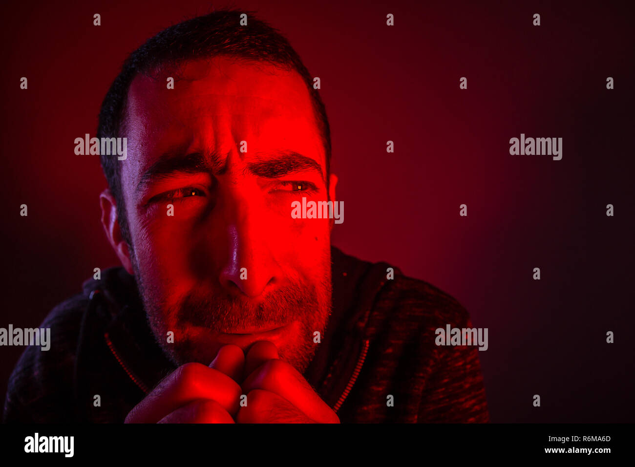 Man with terrified facial expression Stock Photo - Alamy