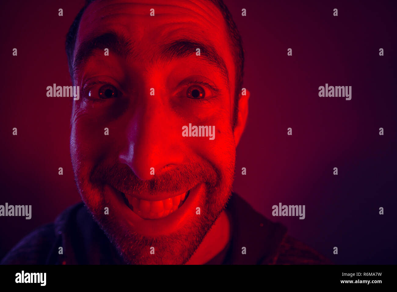 Man with happy smiling facial expression Stock Photo - Alamy
