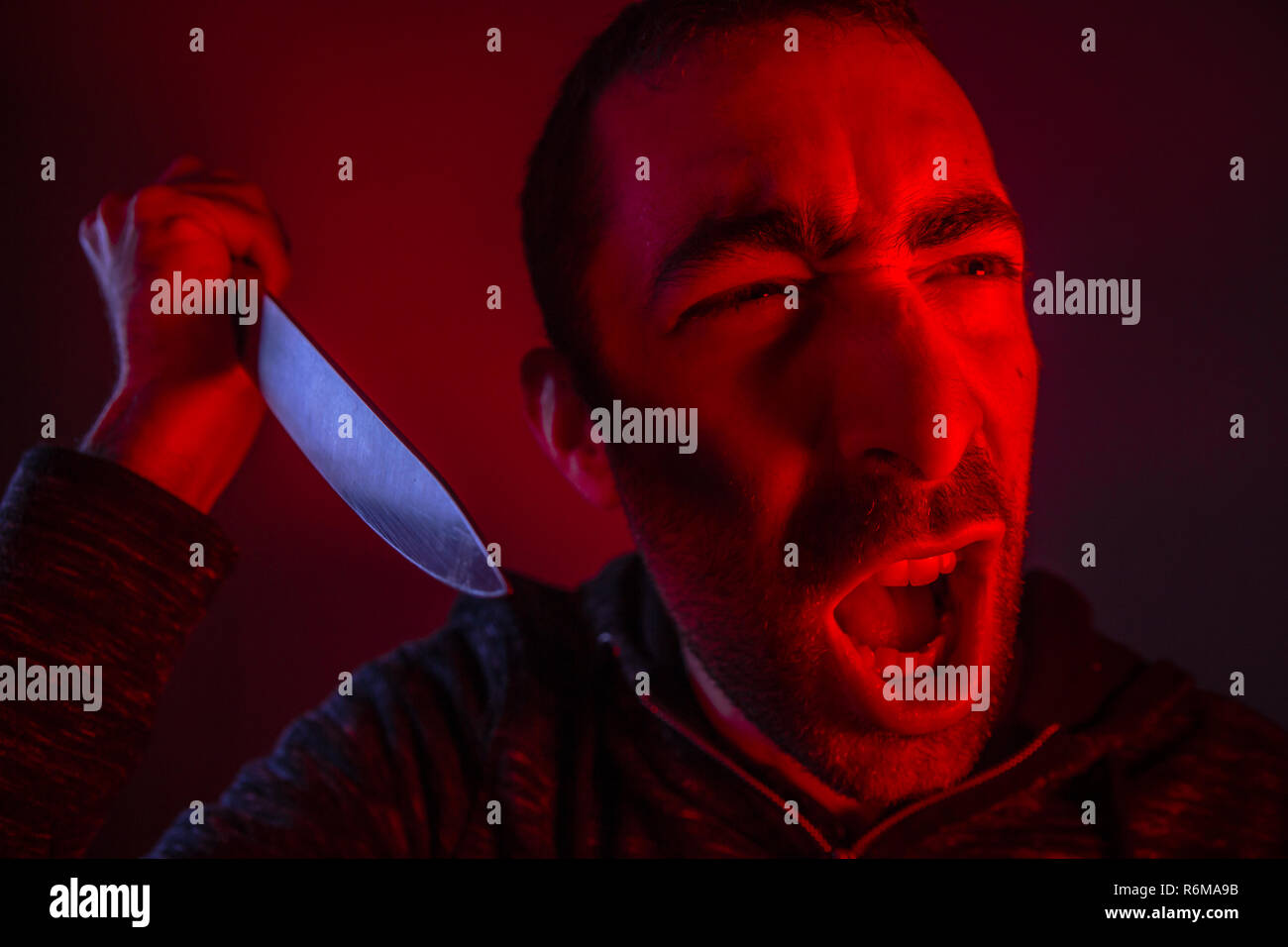 Murder knife face mouth hi-res stock photography and images - Alamy