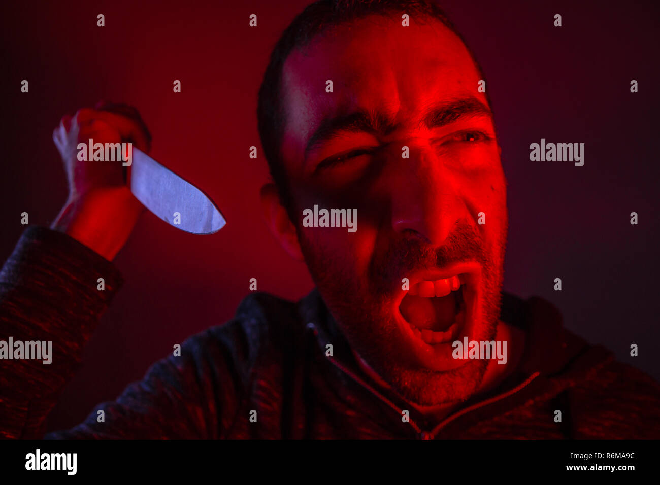 Murder knife face mouth hi-res stock photography and images - Alamy