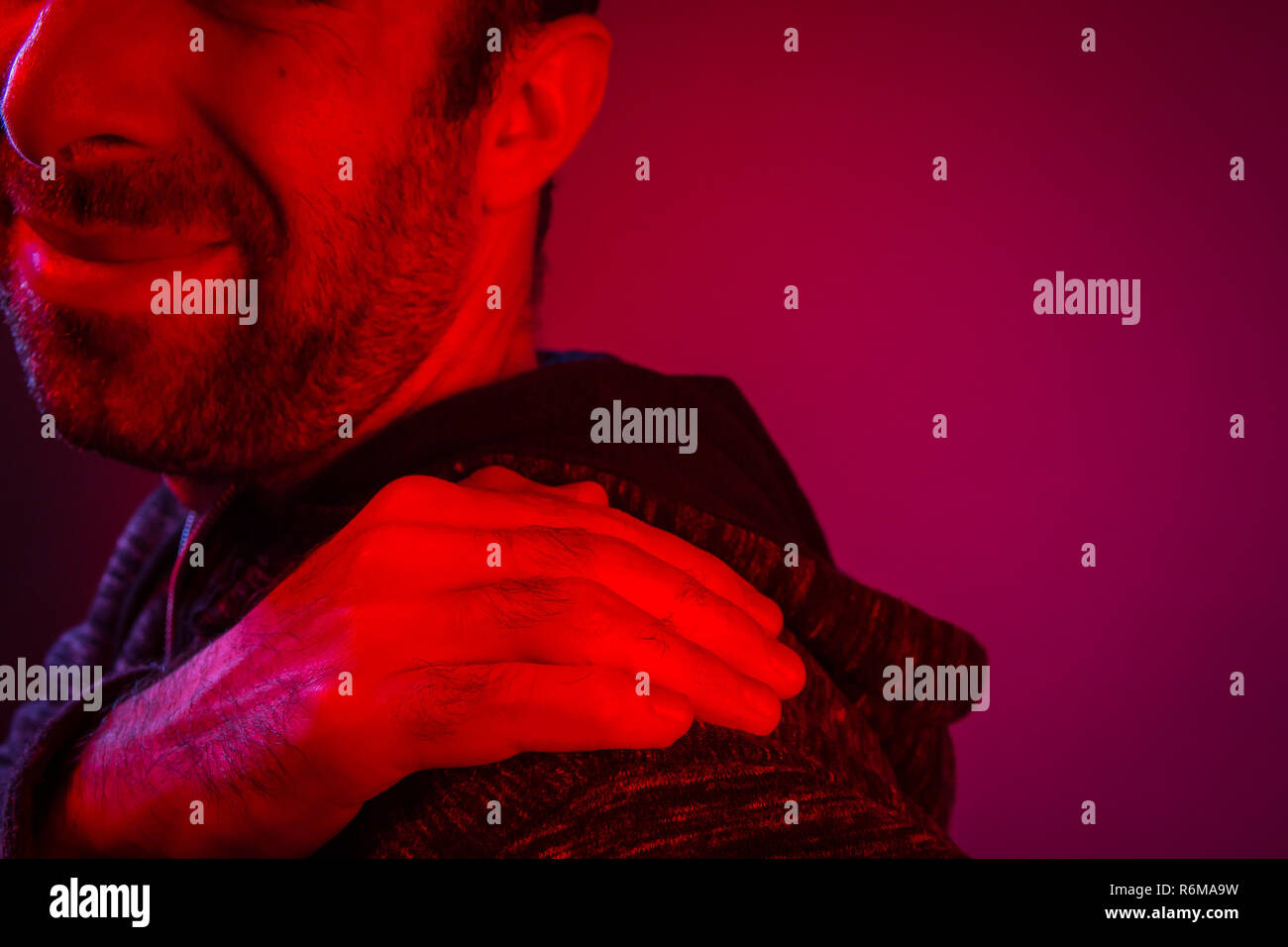 Man is suffering from back shoulder pain Stock Photo - Alamy