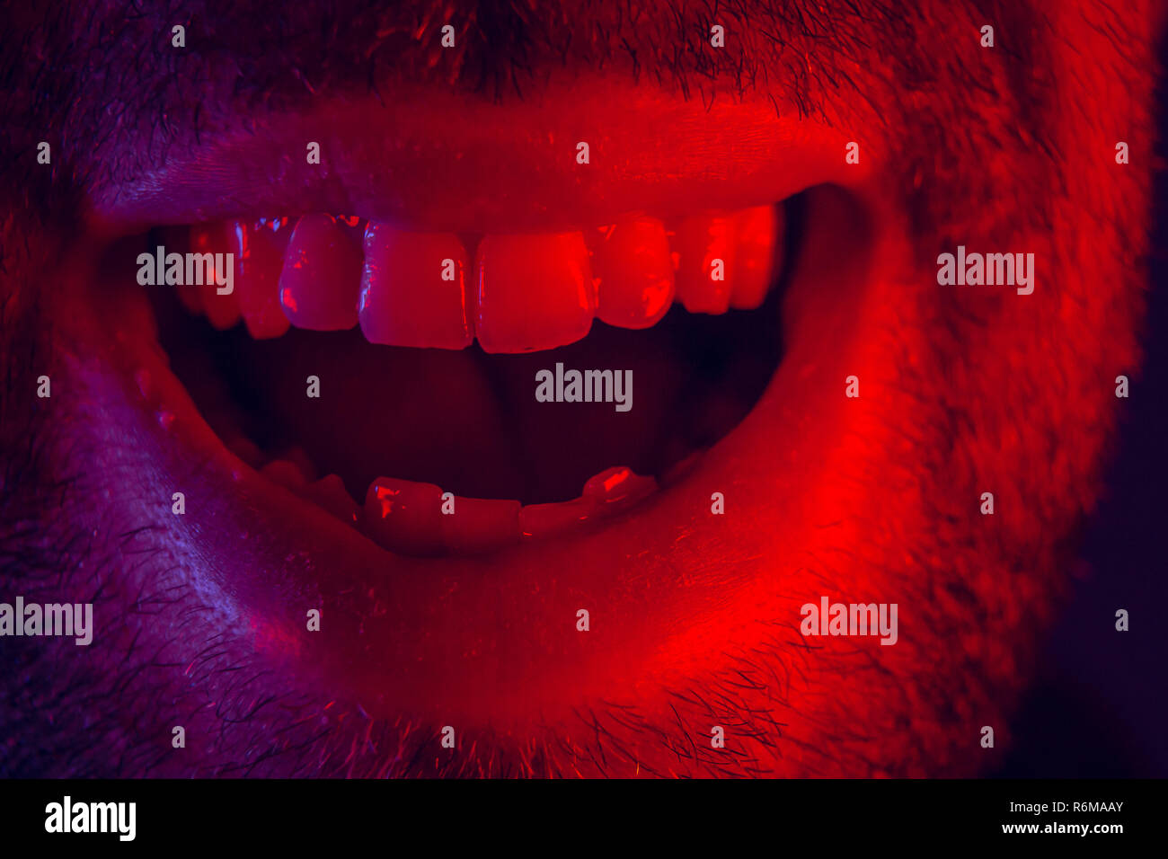 Macro close up on man with happy smiling facial expression Stock Photo ...