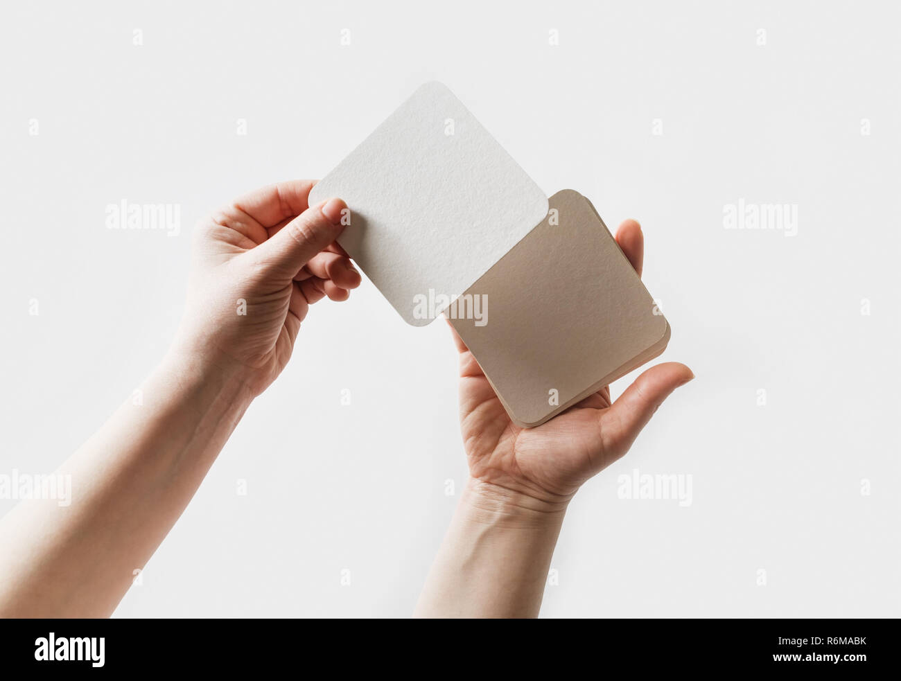 Coasters hand hi-res stock photography and images - Alamy