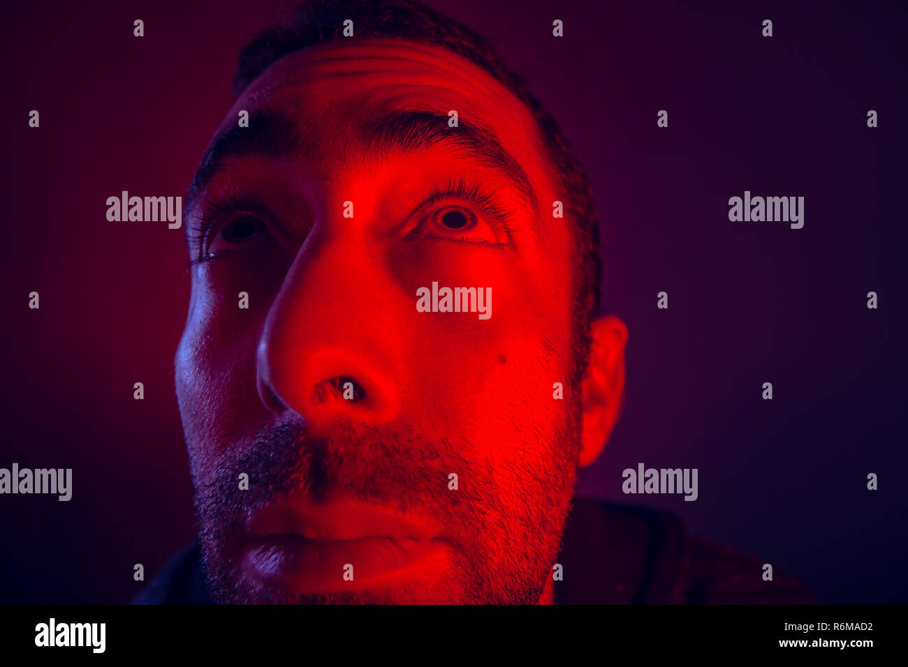 Man with hope facial expression looking up Stock Photo - Alamy