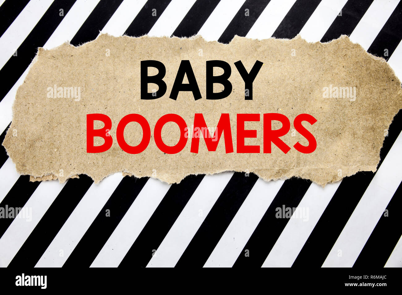 Handwritten text showing Baby Boomers. Business concept writing for ...