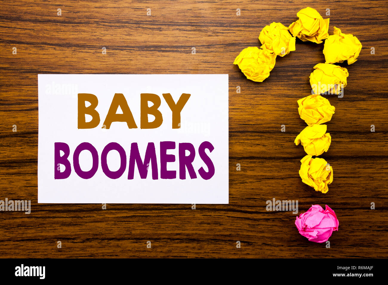 Handwritten text showing Baby Boomers. Business concept for Demographic ...
