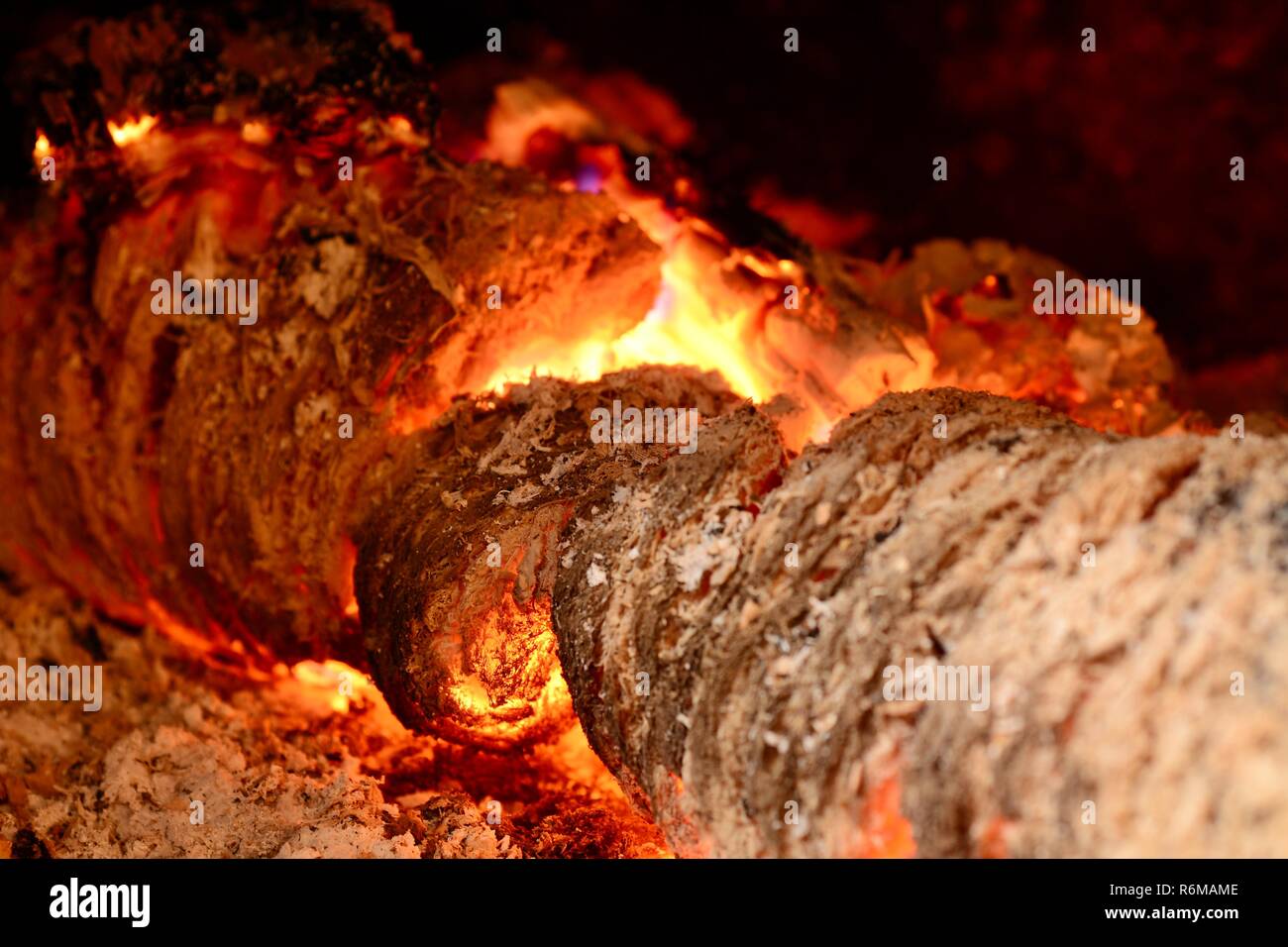 Blazing burning logs in the fireplace Stock Photo - Alamy