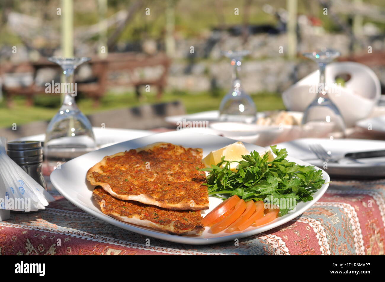 Traditional Cypriot meze and kebap barbecue party in the garden with ...