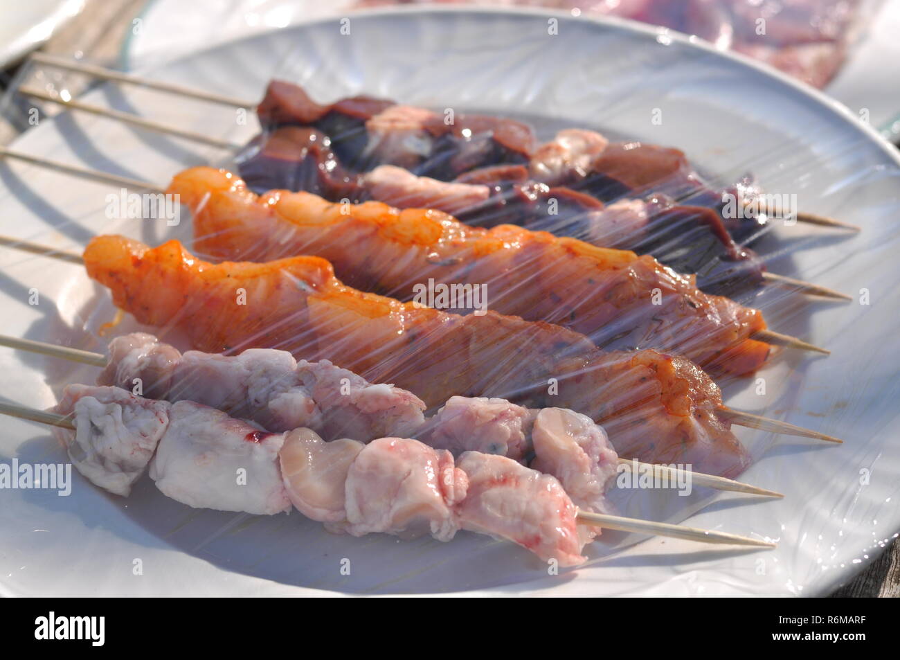 Traditional Cypriot meze and kebap barbecue party in the garden with ...