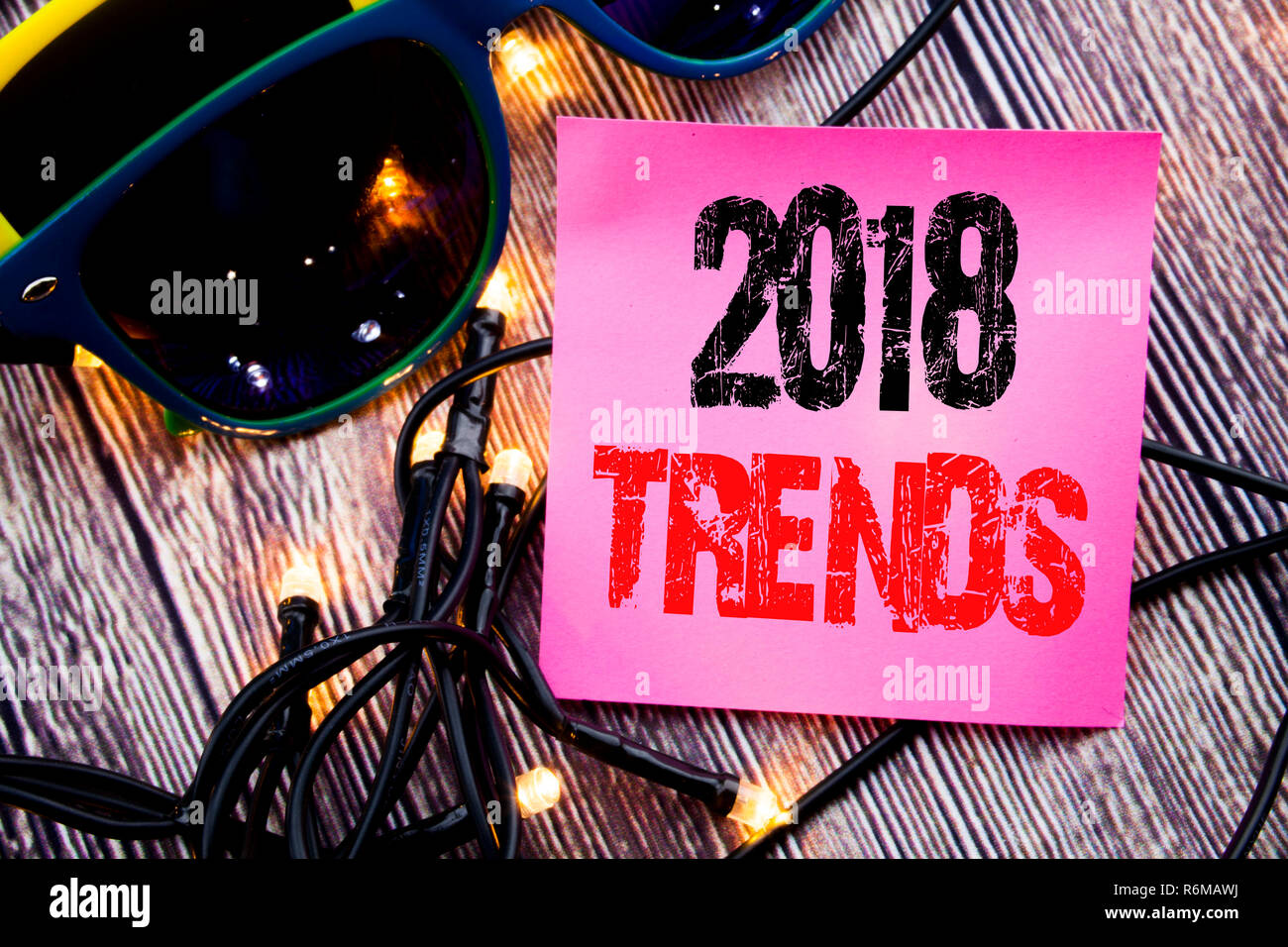 Hand writing text caption showing 2018 Trends. Business concept for ...