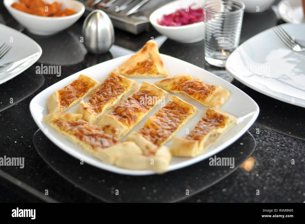 Traditional Cypriot meze and mix meat and chicken kebab table with ...