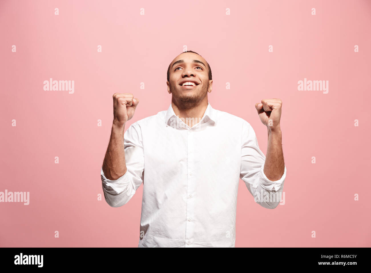 Winning success man happy ecstatic celebrating being a winner. Dynamic ...