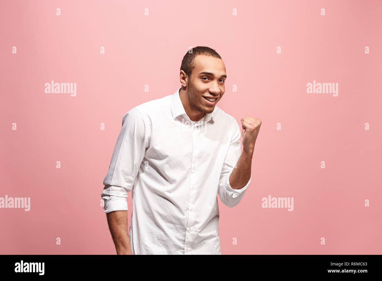 Winning success man happy ecstatic celebrating being a winner. Dynamic ...