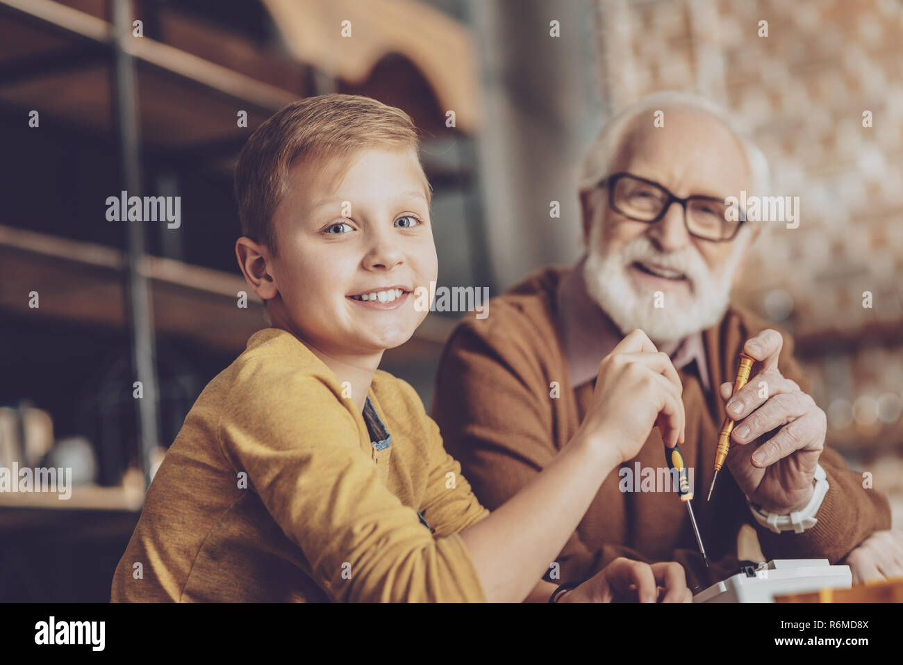 Happy males looking straight at camera Stock Photo - Alamy