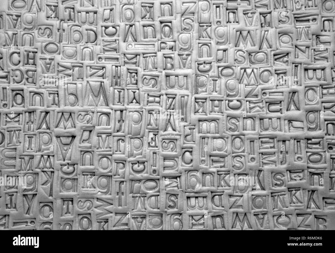 Old letterpress blocks background. Imprinted in modeling clay Stock ...
