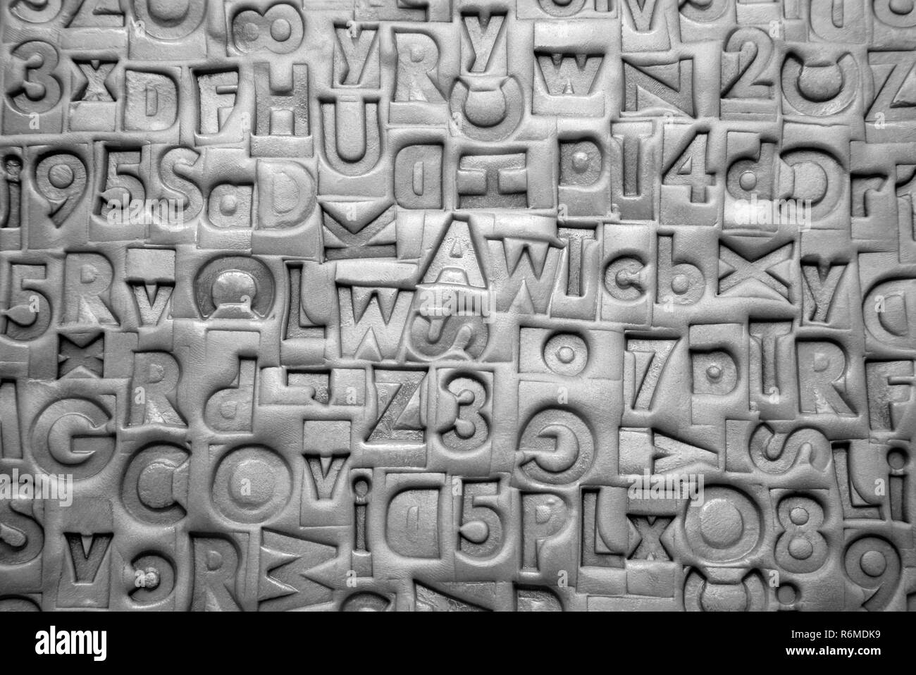 Old letterpress blocks background. Imprinted in modeling clay Stock ...