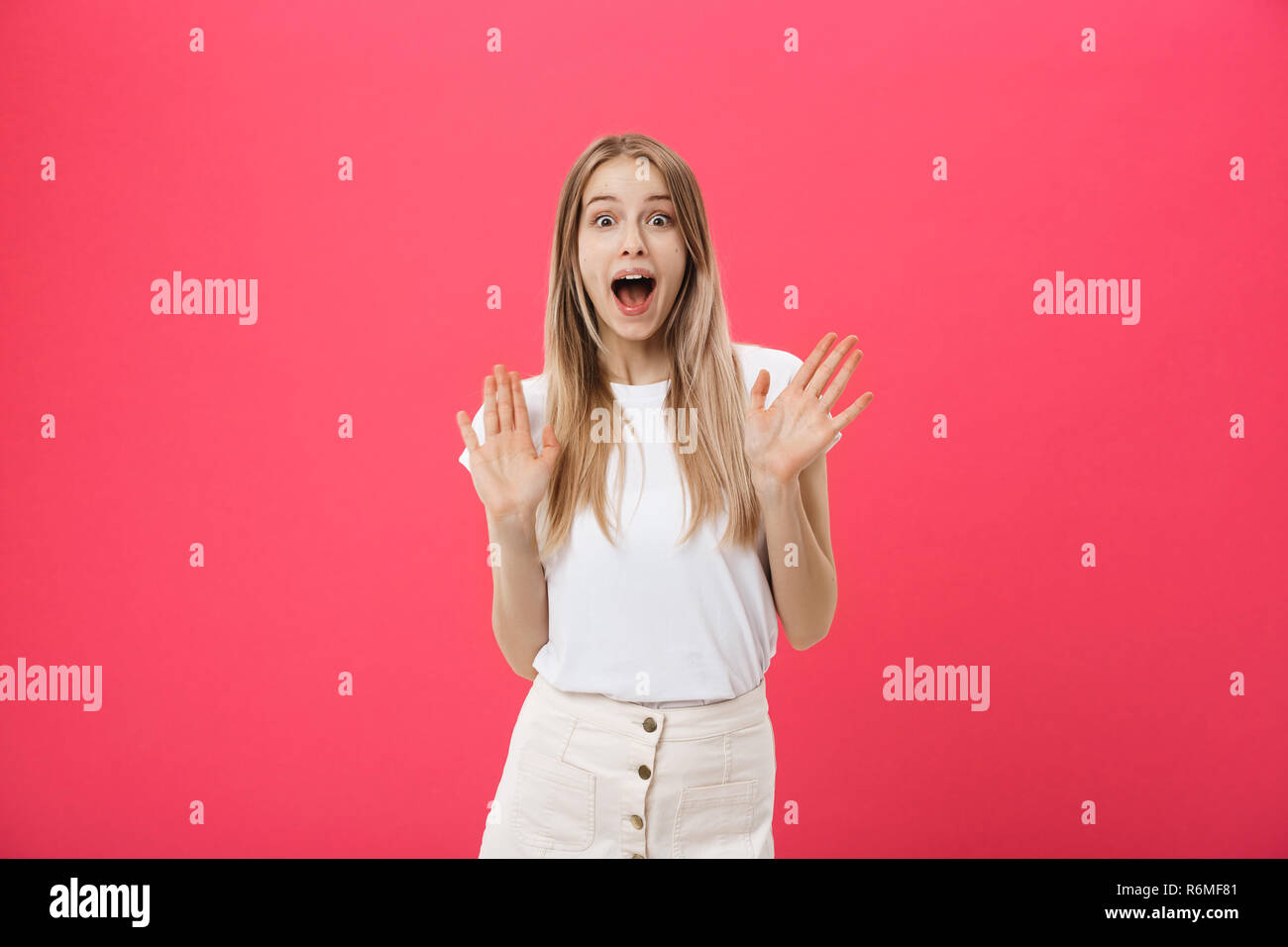 Surprised teenage student girl show shocking expression with something ...