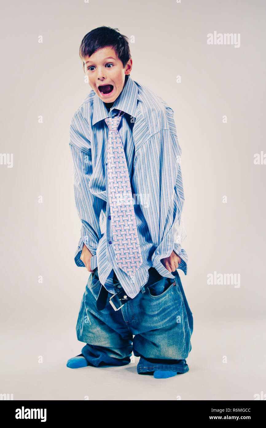 funny boy wearing Dad's clothes Stock Photo - Alamy