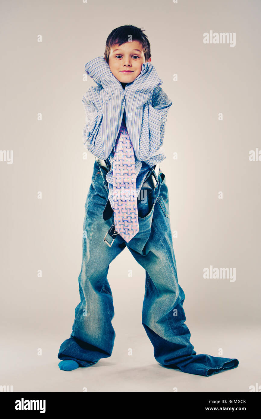funny boy wearing Dad's clothes Stock Photo - Alamy