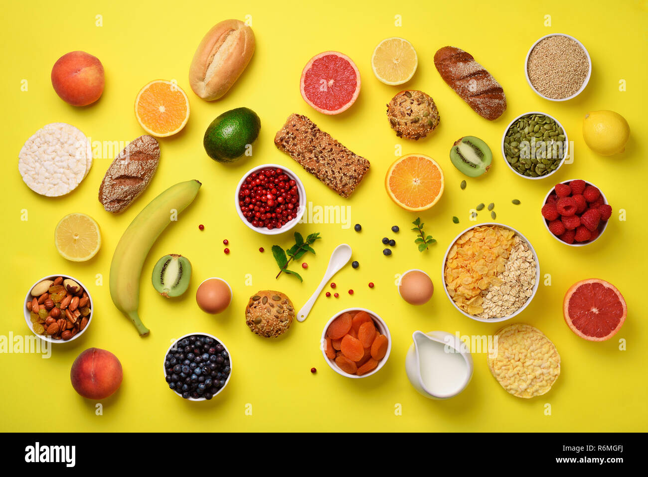 Healthy breakfast ingredients, food frame. Oat and corn flakes, eggs ...