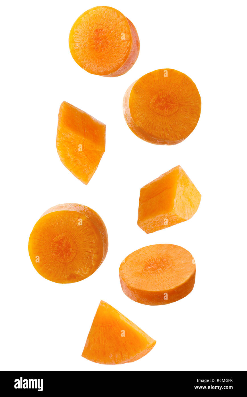 Falling sliced carrot isolated on white Stock Photo - Alamy