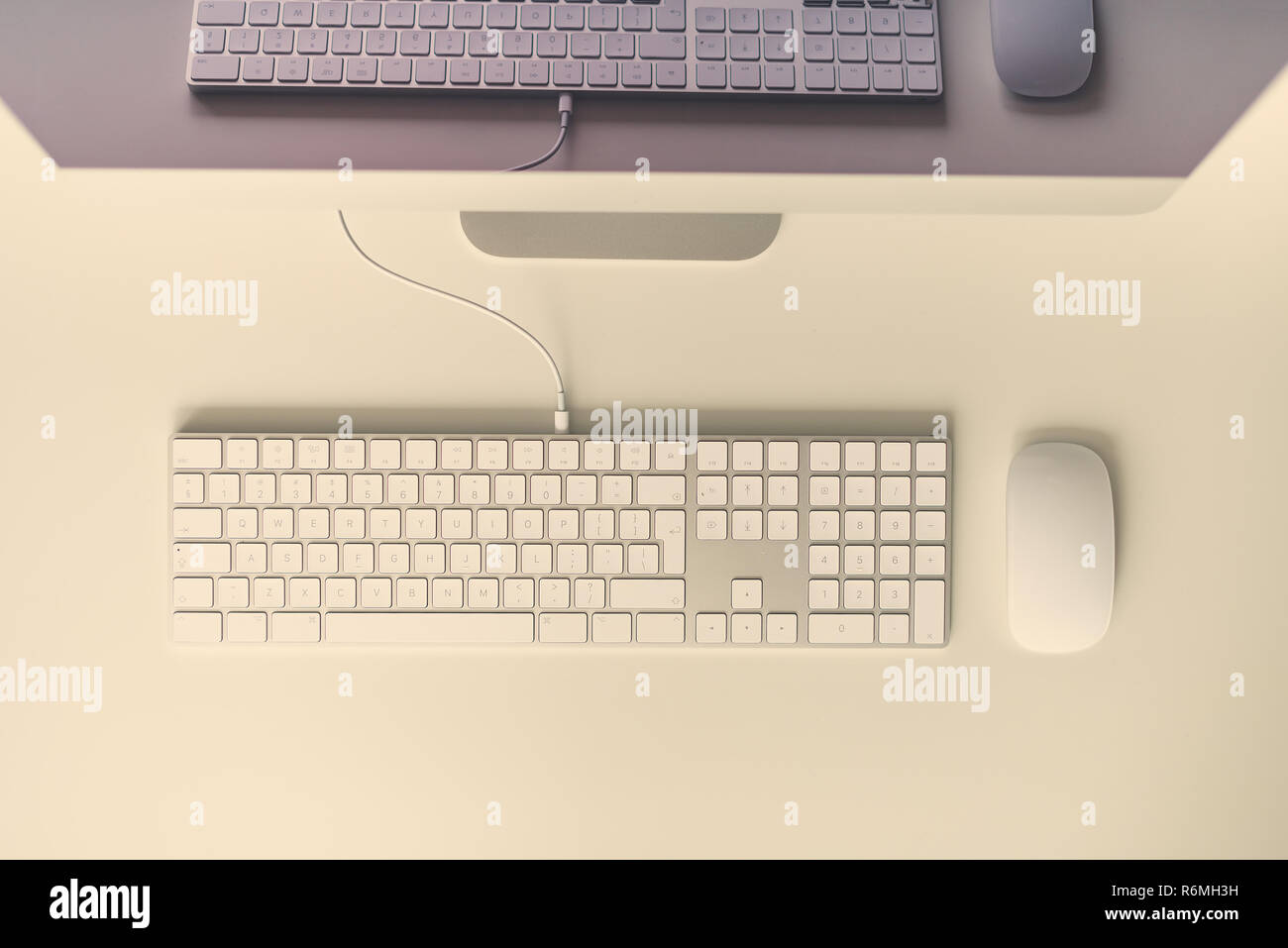 Minimalistic workspace. White office desk table with computer keyboard ...