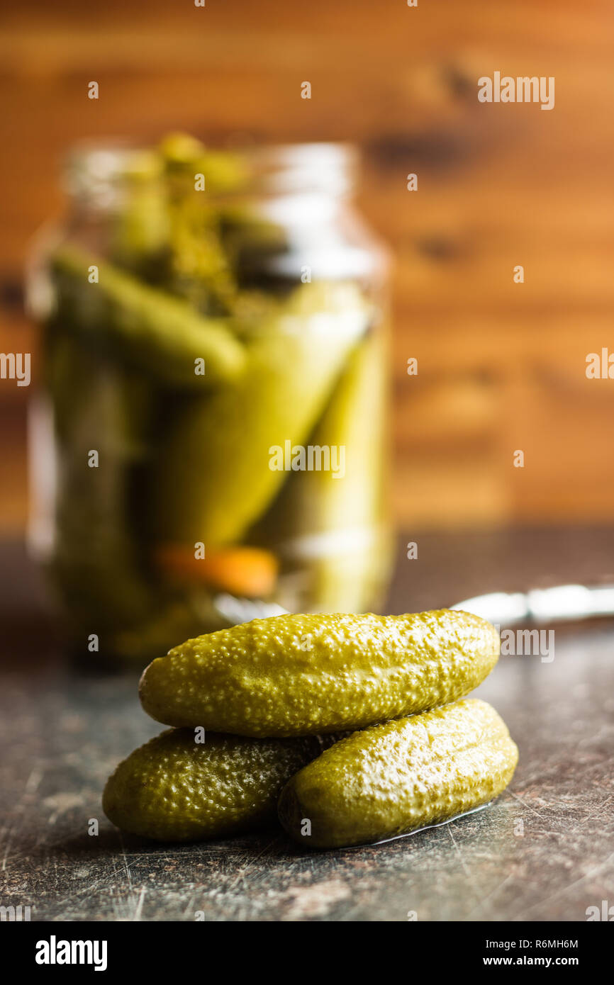 Pickles in bowl. Tasty preserved cucumbers Stock Photo - Alamy