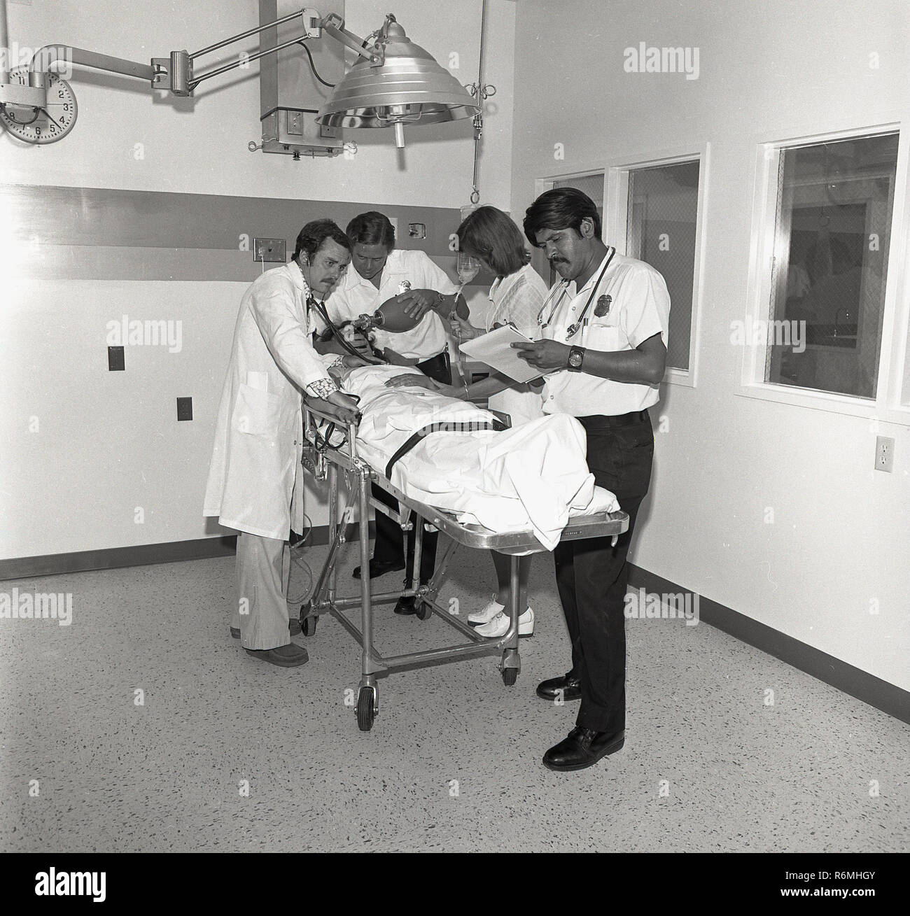 1970s, historical, american healthcare, inside a room at a hospital, a ...