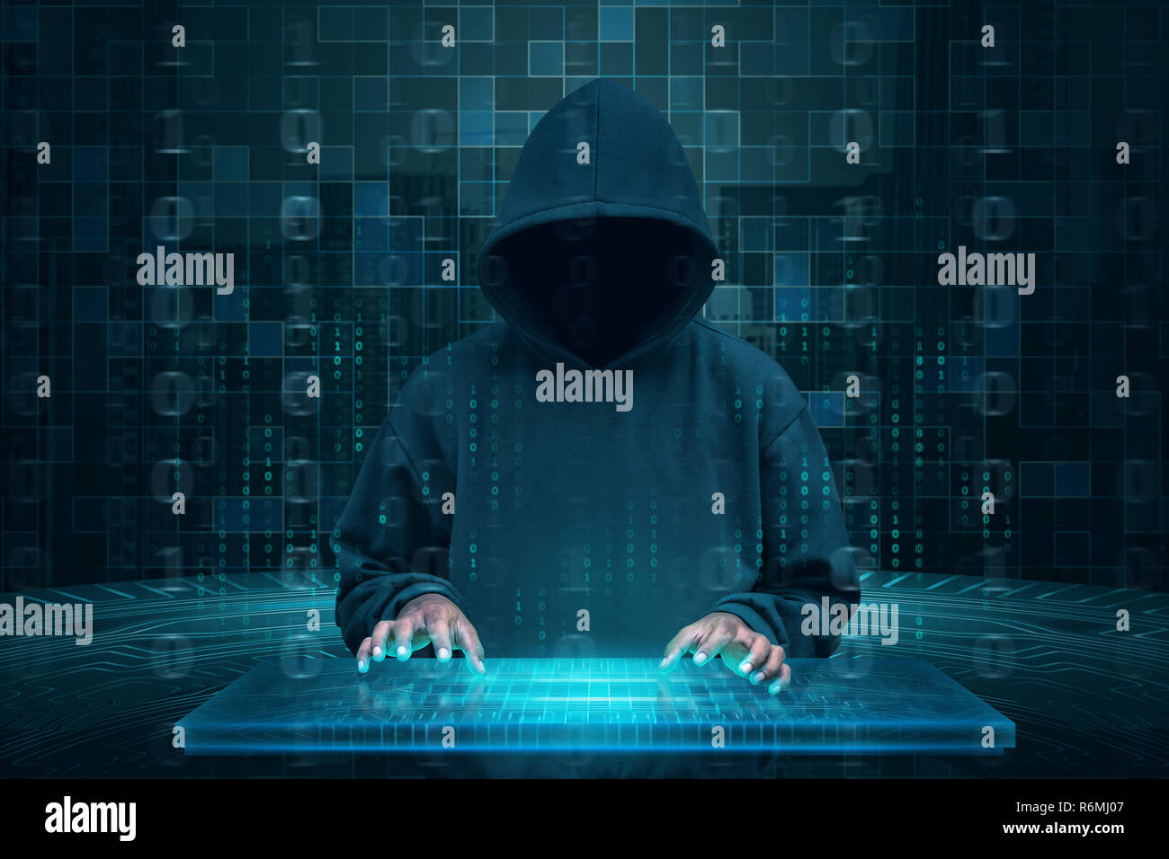 Hacker with hoodie using virtual keyboard to hacking system Stock Photo ...