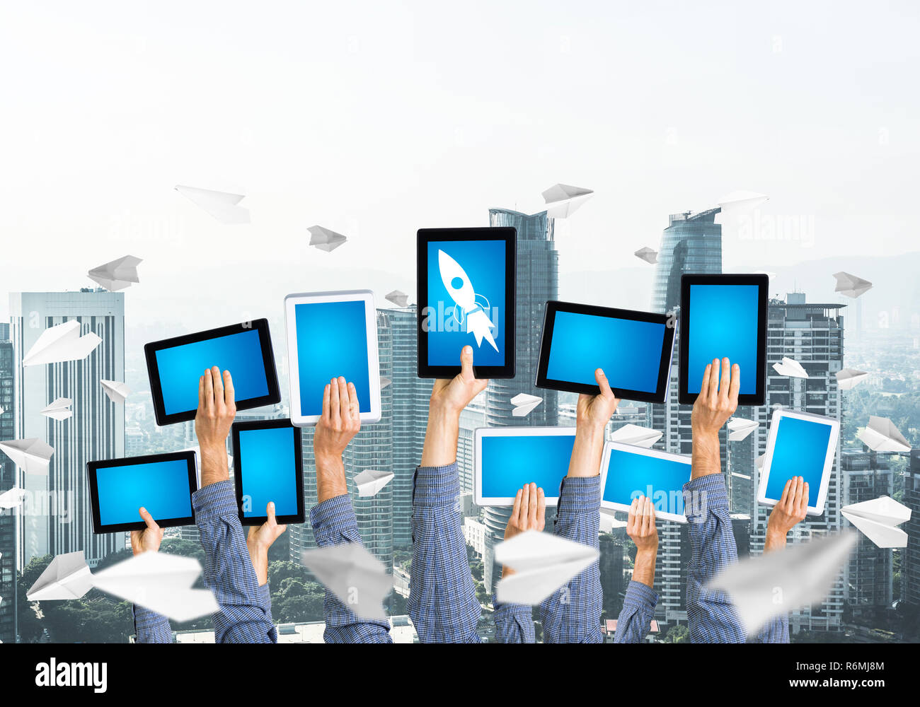 Close of man hands in line showing tablet pc with blank blue screen ...