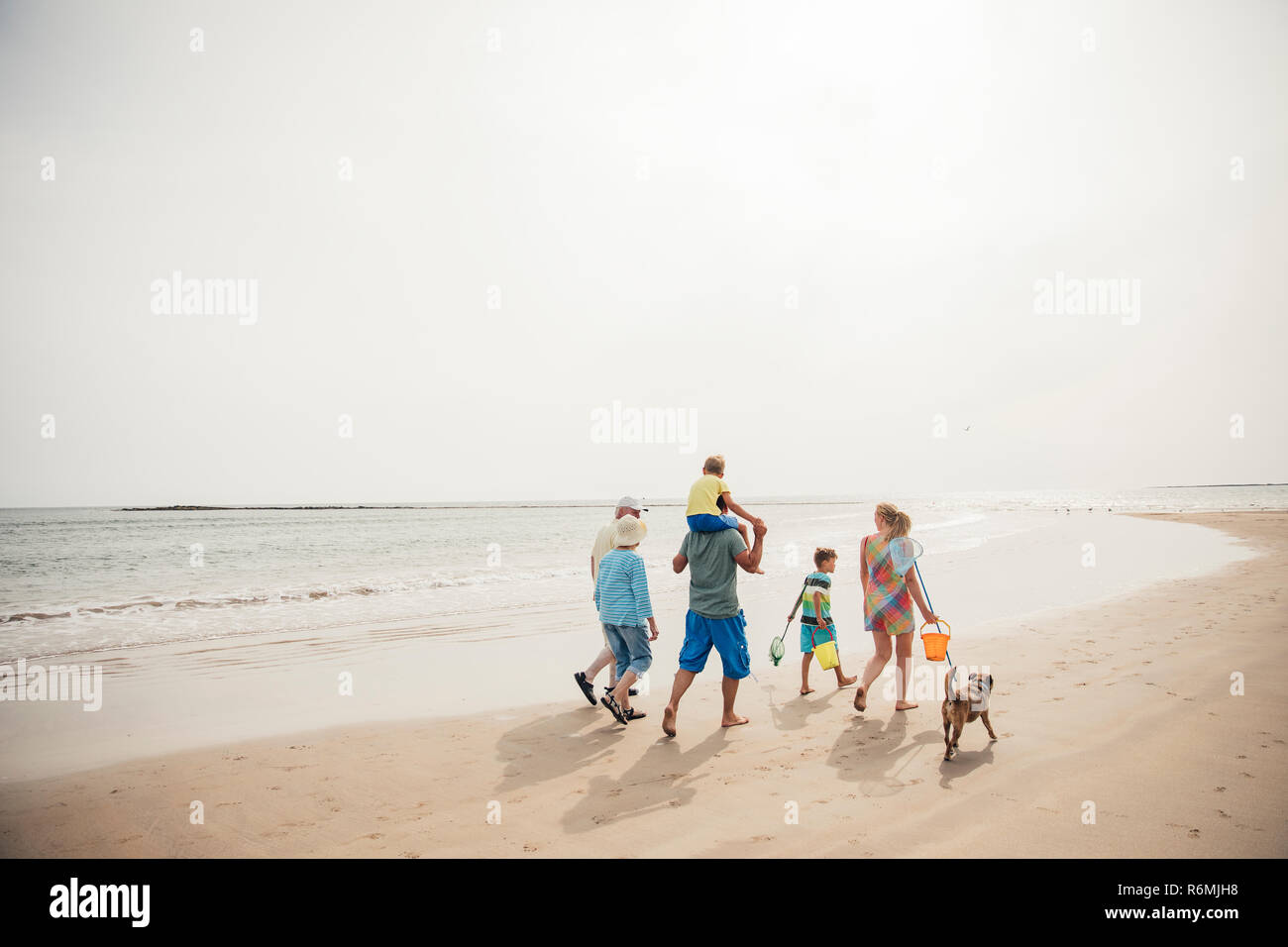 Walking Along the Beach Stock Photo - Alamy