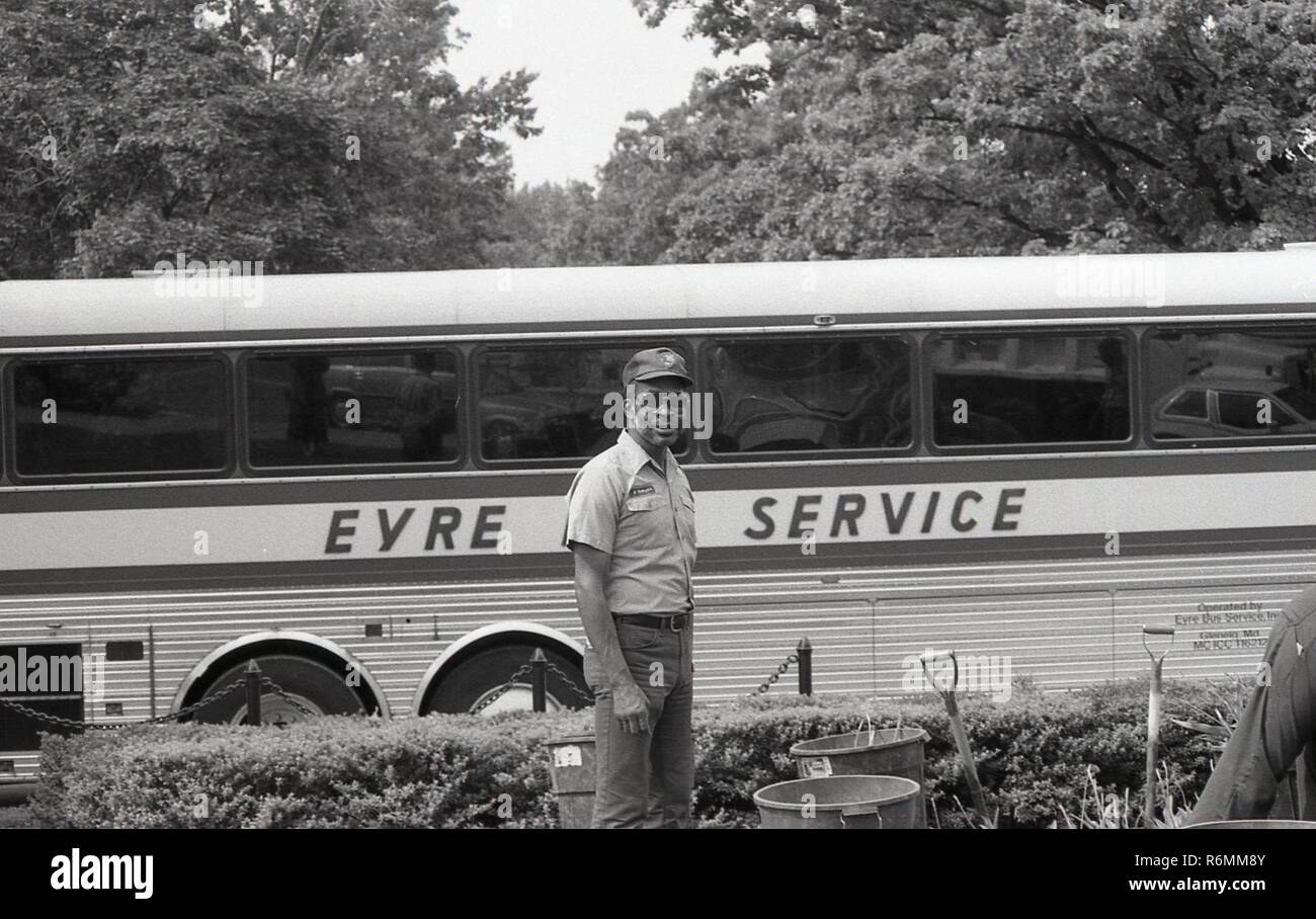 a man standing in front of a bus. Bus - Eyre Service Stock Photo - Alamy