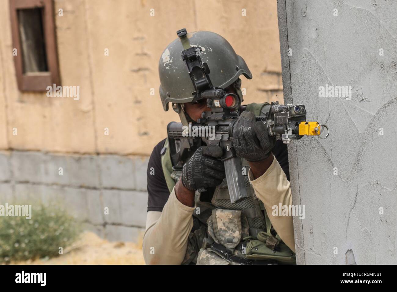 FORT IRWIN, Calif. – Utilizing cover and concealment, a Trooper from ...