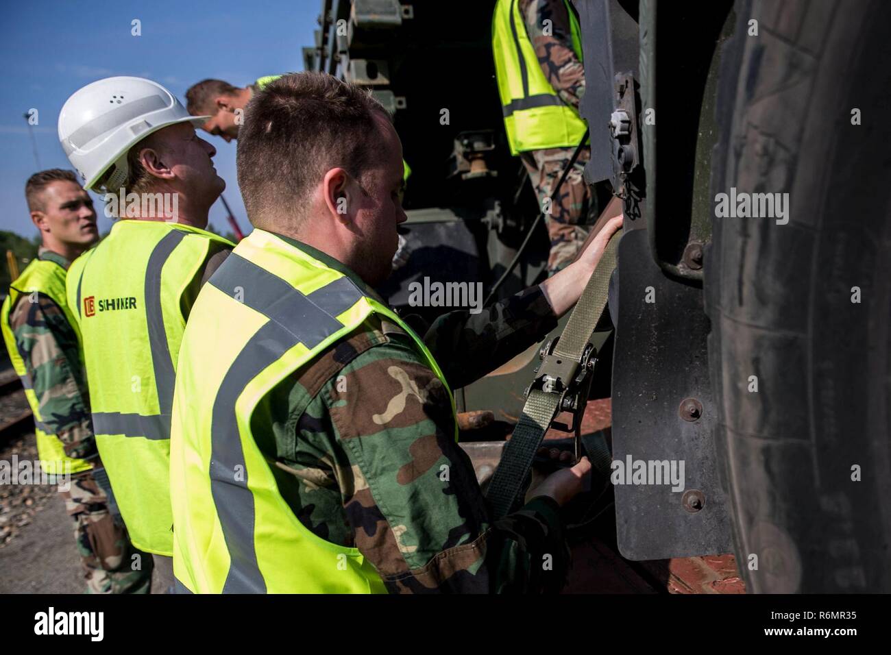 Dutch Marines in cooperation of MOVECON units load their equipment on ...