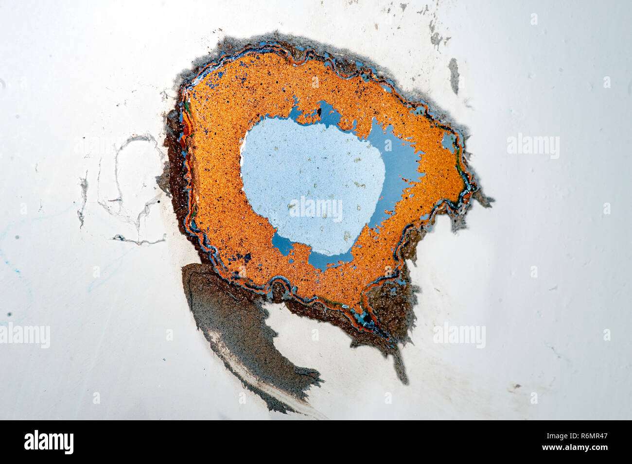 rusty spot on painted plaster wall Stock Photo - Alamy