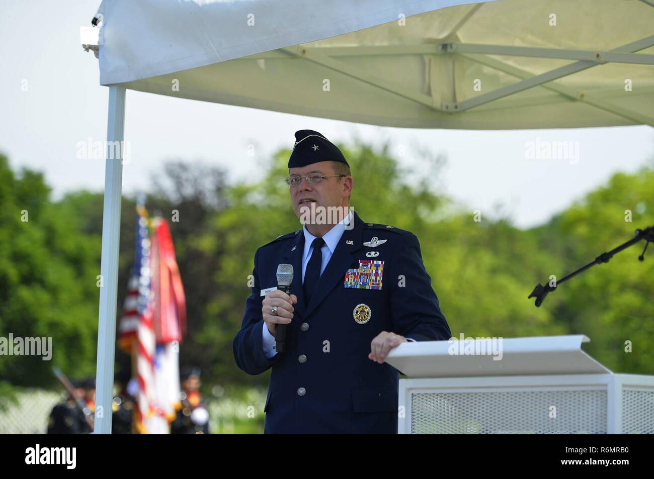 Brig. Gen. Richard G. Moore, 86th Airlift Wing commander, speaks at a ...