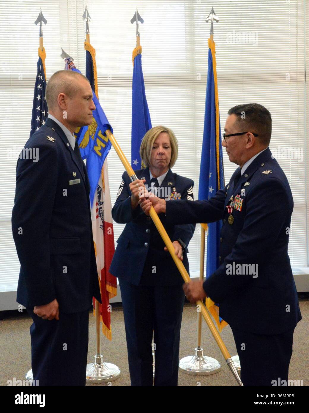 Col. Jim P. Duong (right), 132d Wing (132 WG) outgoing Medical Group ...