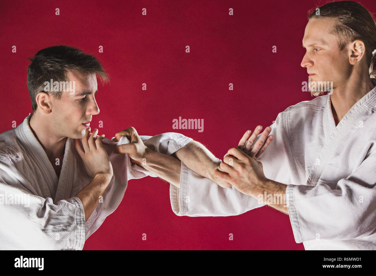 Two men fighting at Aikido training in martial arts school Stock Photo ...