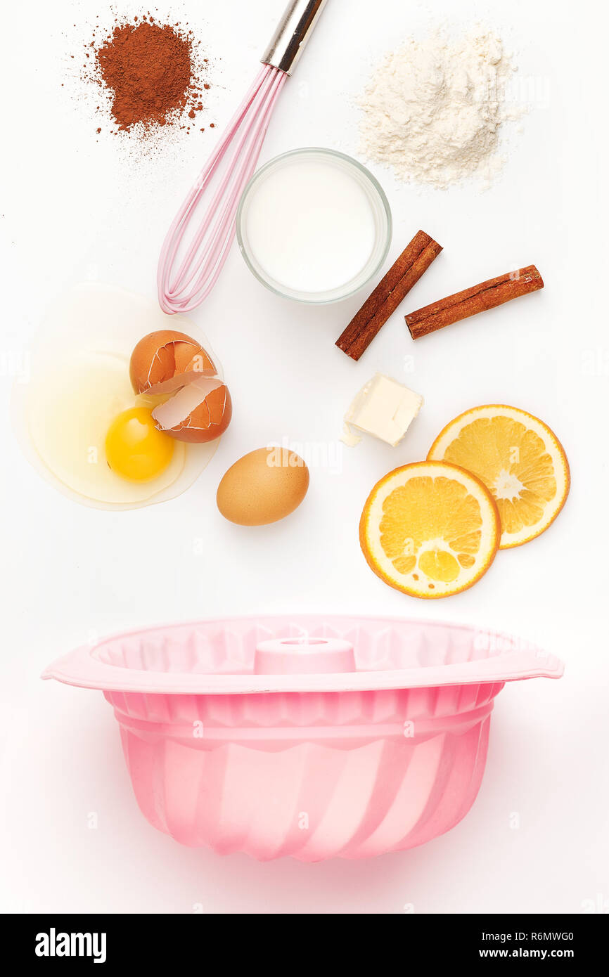 The falling ingredients of pie or cake on white background Stock Photo ...