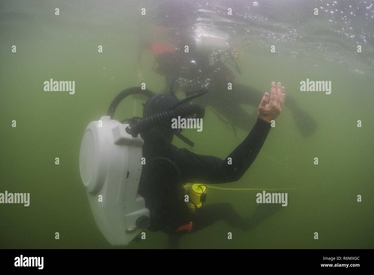 U.S. Navy Sailors assigned to Explosive Ordnance Disposal Group One ...