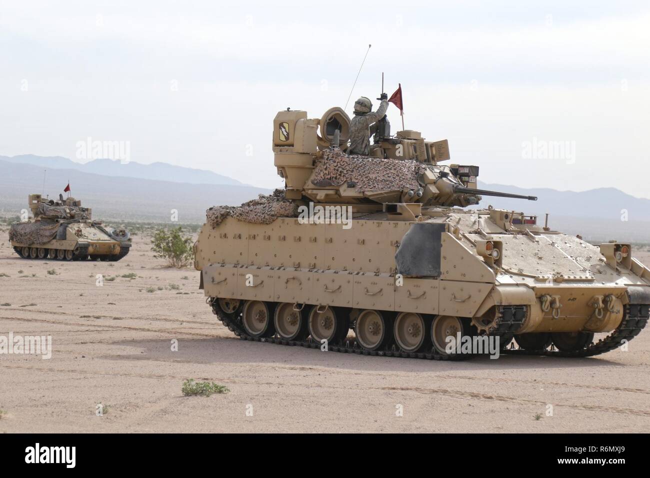 A Bradley Fighting Vehicle commander with the 2nd Battalion, 198th ...