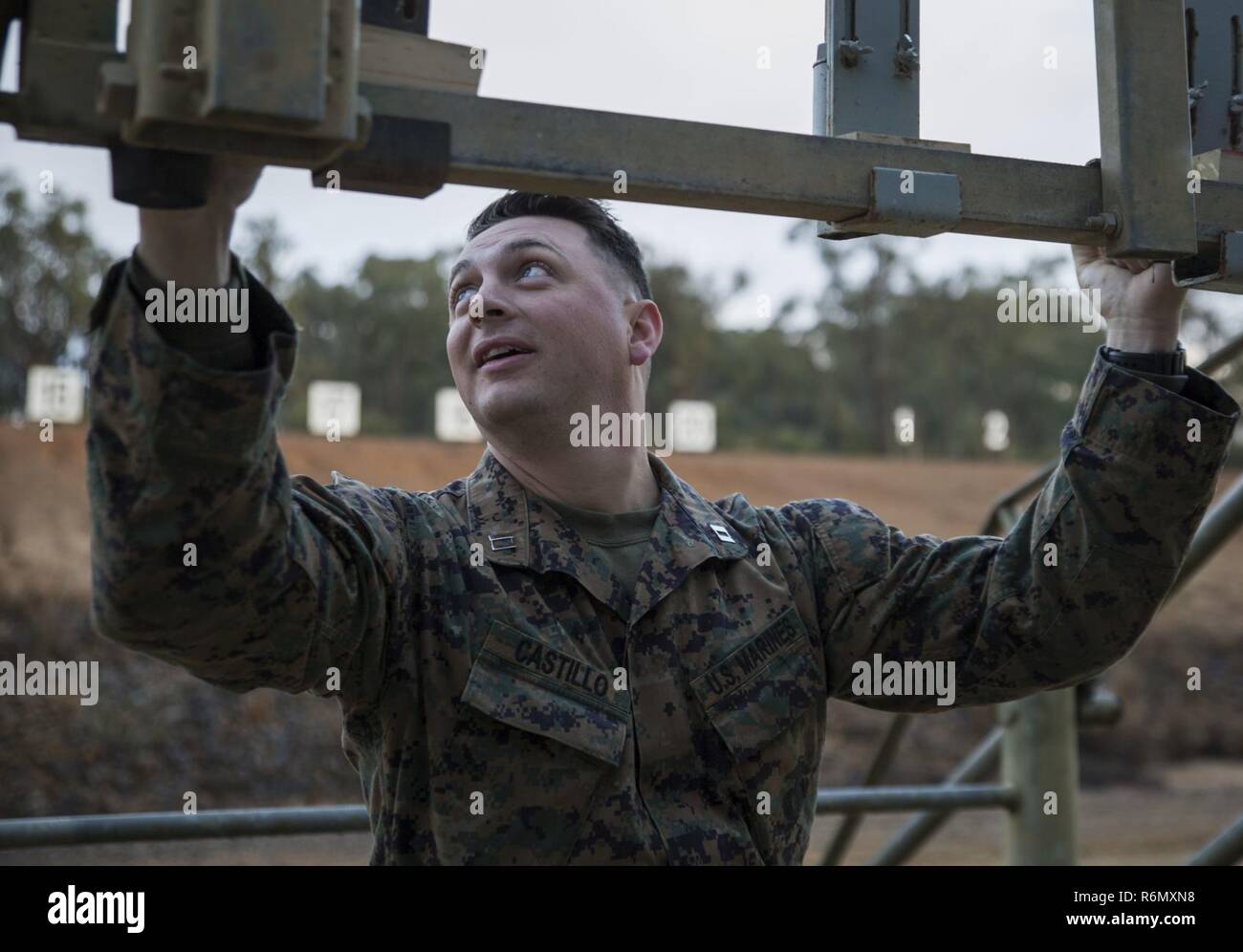 U.S. Marine Corps Capt. Jacob Castillo pulls pits, May 24, 2017, at the ...