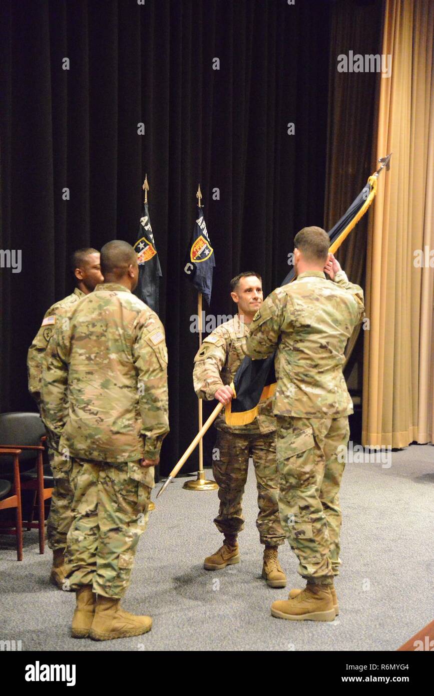 U.S. Army Lt. Col Michael F. Minaudo (outgoing Commander), gives the ...