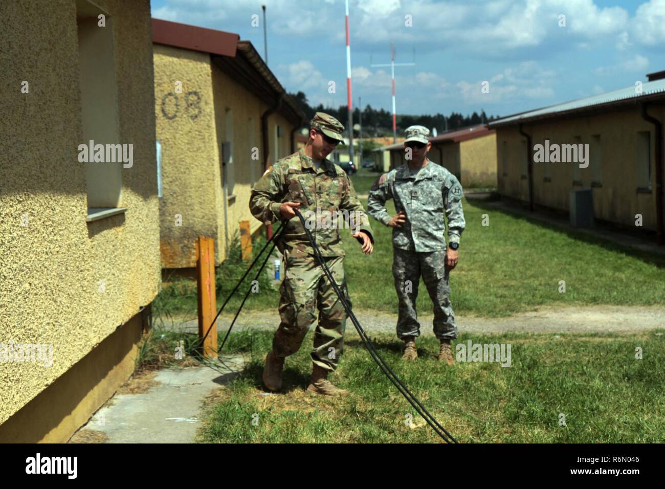 1st Lt Zachary Grove, a sapper platoon leader, and Sgt 1st Class Austin ...