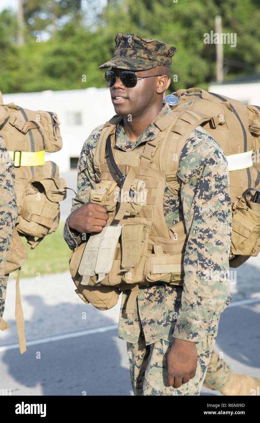 U.S. Marine LCpl. Careaf Henson a combat photographer with Headquarters ...