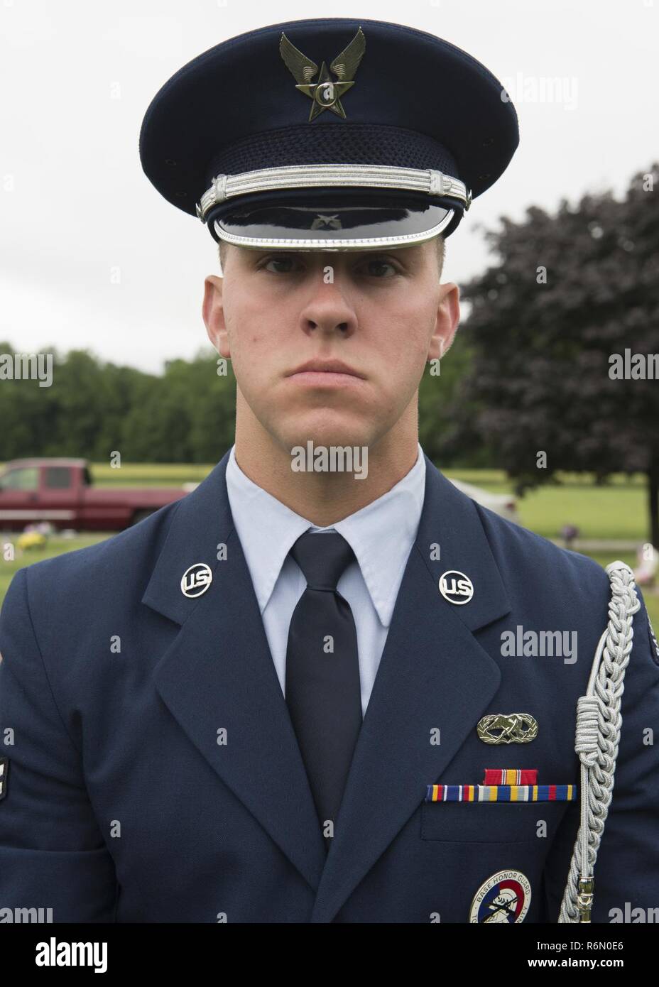 Airman 1st Class Kyle Dillon stands at attention during a Memorial Day ...