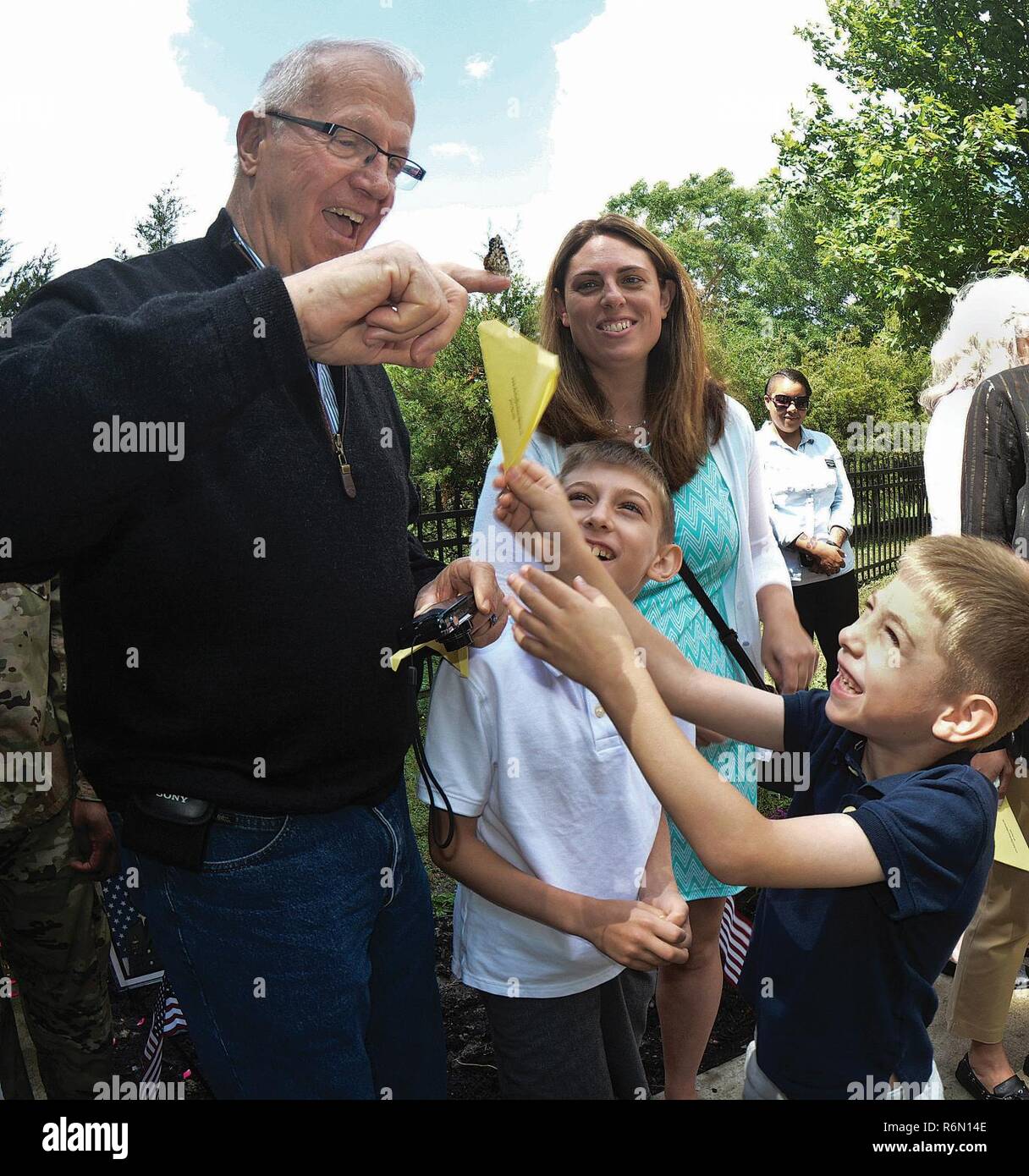 Jake and Chase Sullivan laugh at their grandfather while he jokes about ...