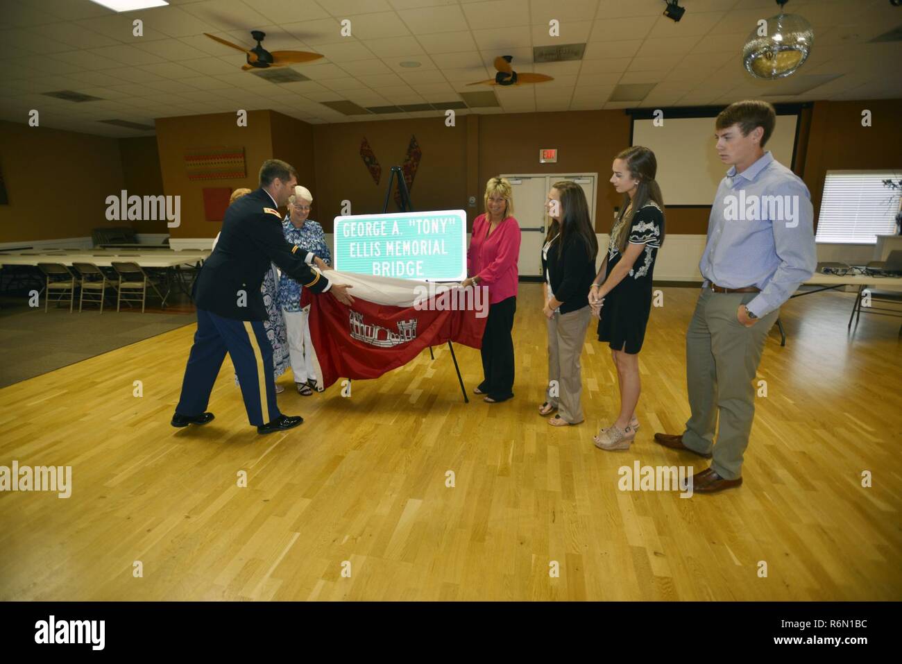 The family of Tony Ellisi unveils a new sign bearing his name. The US ...