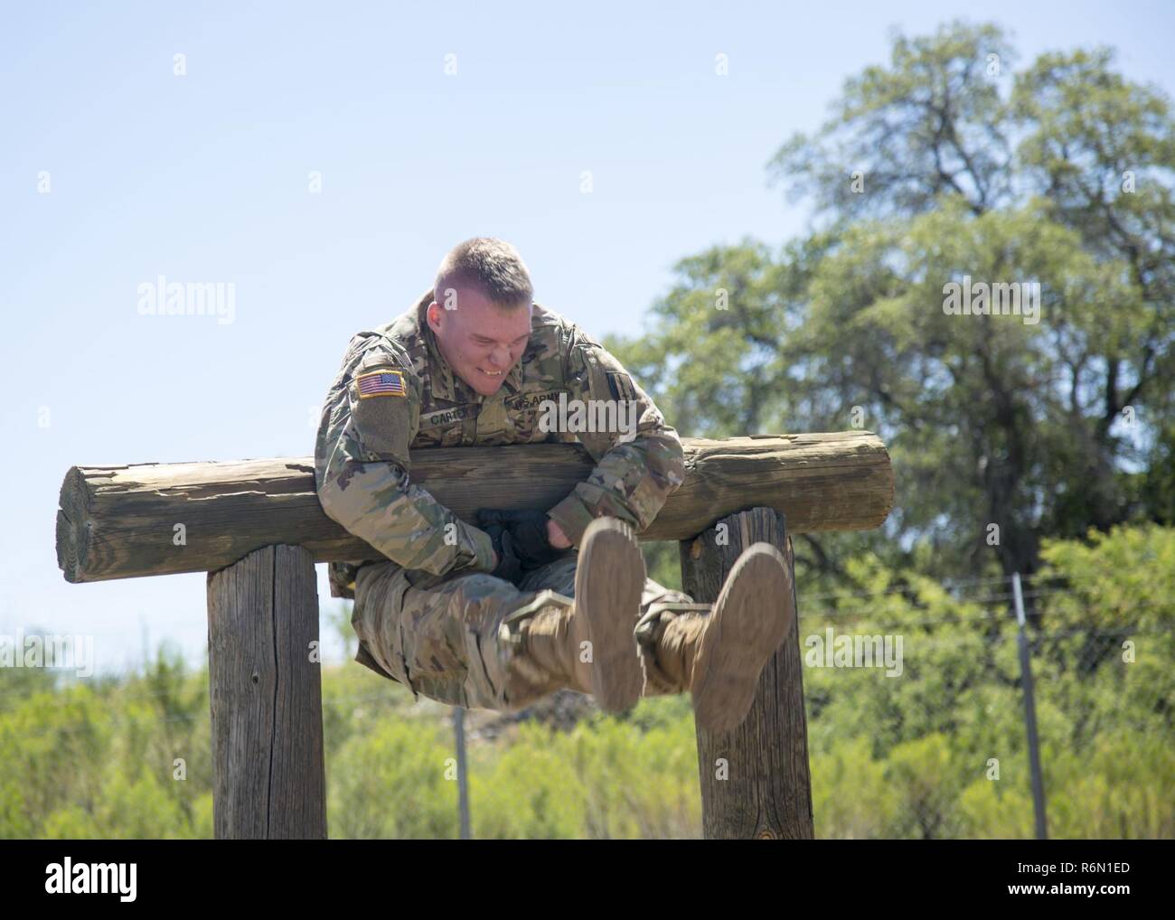 U.S. Army Spc. Justin M. Carter, assigned to 275th Signal Company ...