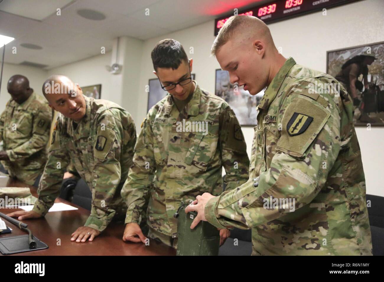 U.S. Army Spc. Justin Carter, assigned to 275th Signal Company, 311th ...